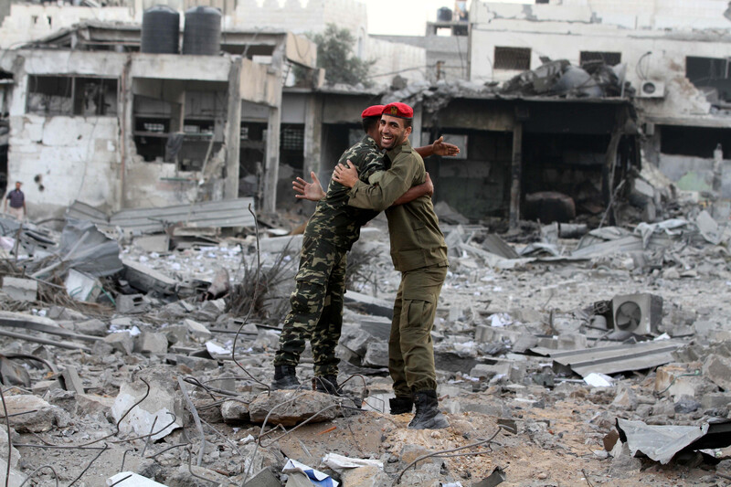 In photos: Palestinians in Gaza celebrate victory, mourn those lost ...